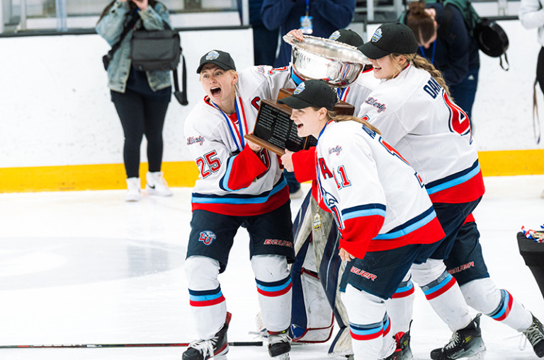 Lady Flames celebrate seventh ACHA DI national title, edging Saints 2-1 ...